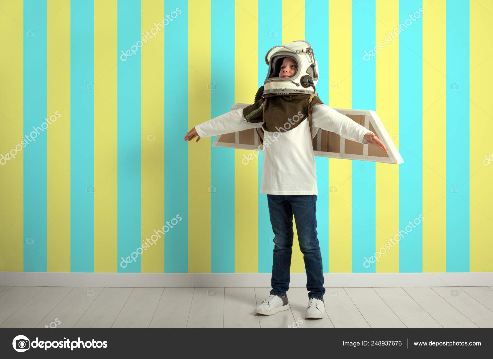 A model boy posing on gray background Stock Photo by ©vovan13 248937676