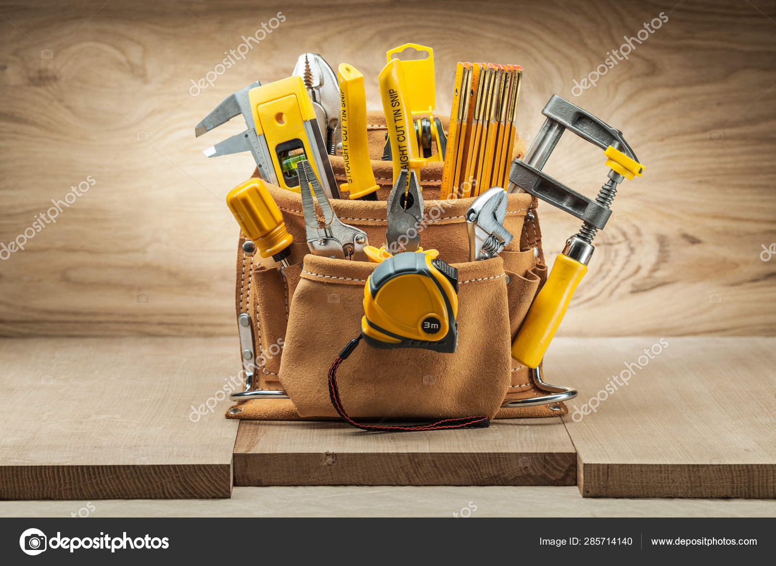 Leather tool belt with construction tools on wood backgeound — Stock ...