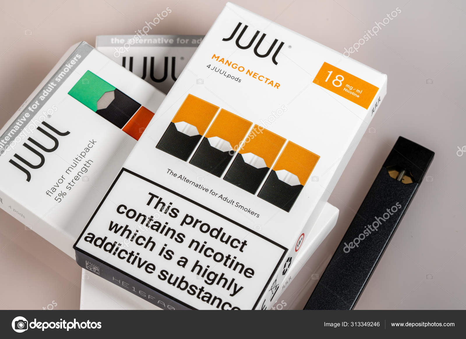 Box holding flavored JUUL nicotine dispenser and pods – Stock Editorial ...
