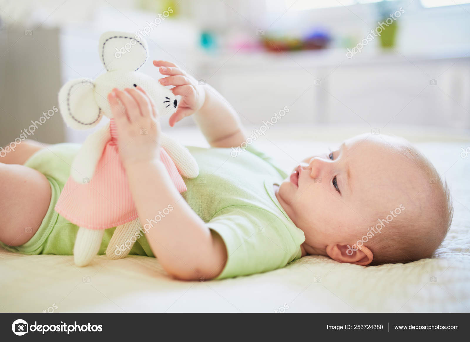 Cute baby girl lying on her back — Stock Photo © encrier #253724380