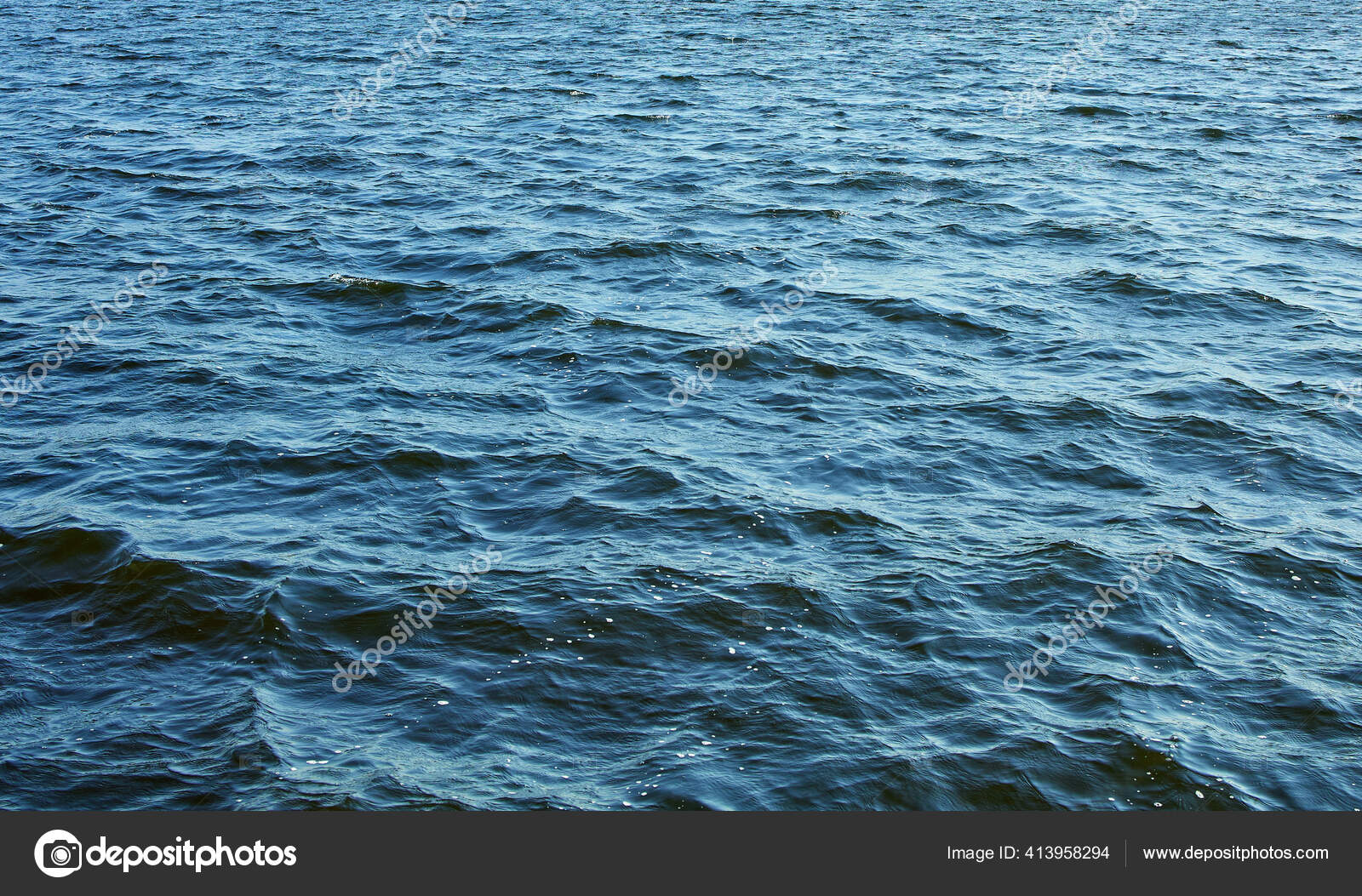 Blue Wavy Water Surface Background Stock Photo by ©magone 413958294
