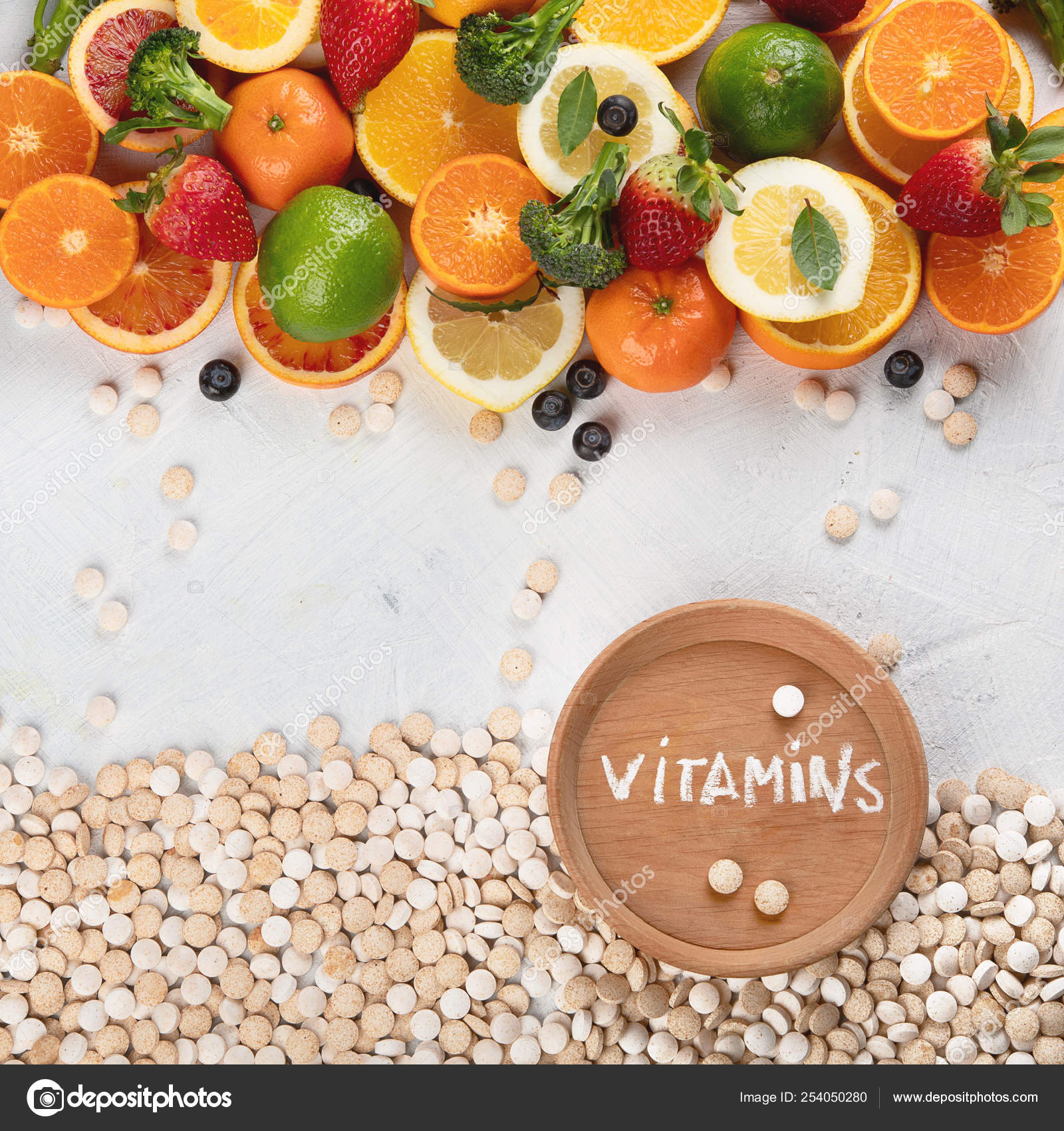 Vitamins in fruits and vegetables and vitamin pills Stock Photo by ...