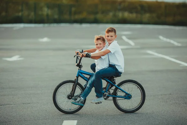 Kids riding bikes Stock Photos, Royalty Free Kids riding bikes Images ...