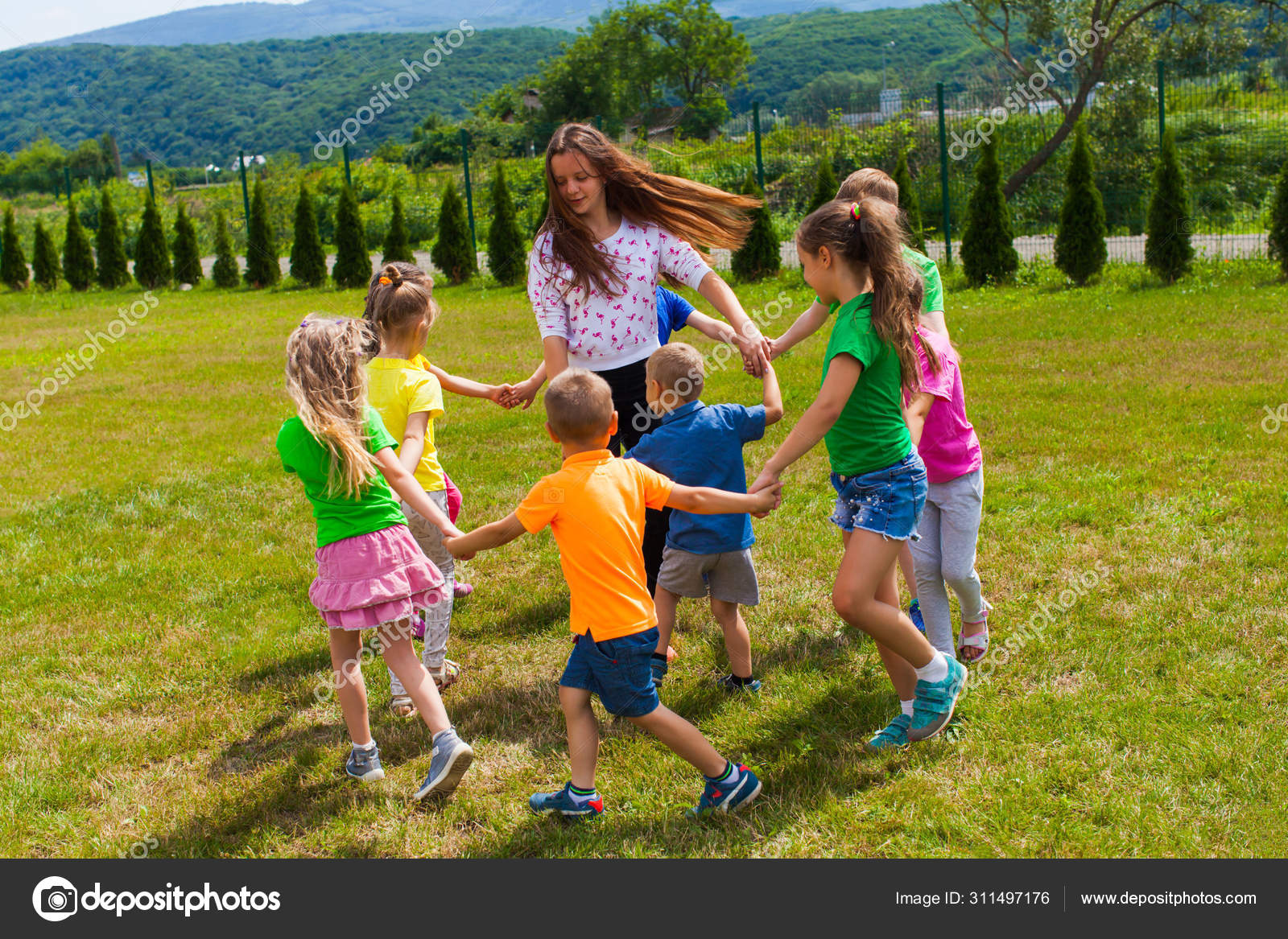 Children Holding Hands In A Circle