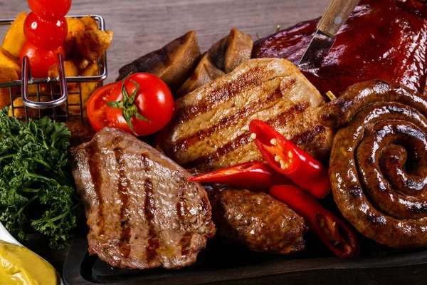 Grilled meat mix plate - beef, pork and chicken - Stock Image - Everypixel