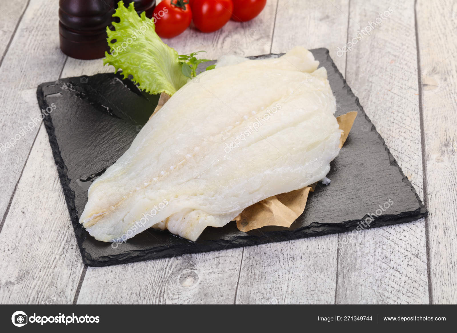Raw halibut fillet Stock Photo by ©AndreySt 271349744