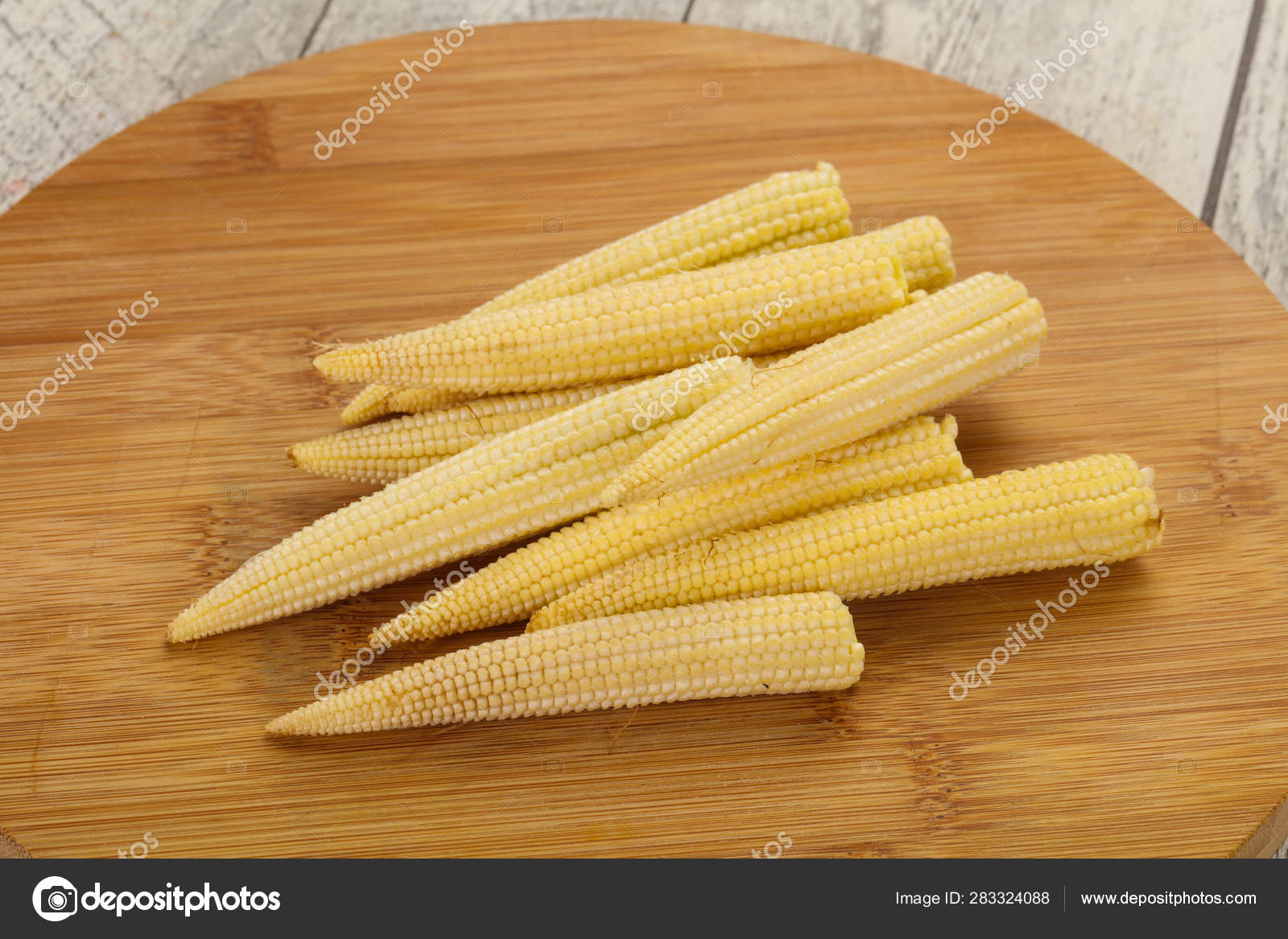 Raw baby corn — Stock Photo © AndreySt #283324088