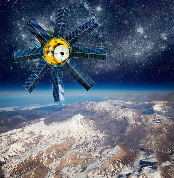 Space satellite orbiting the earth. Elements of this image furnished by ...