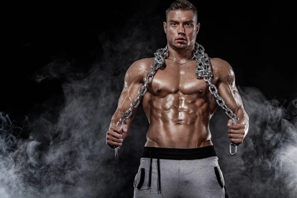 Shirtless man chains Stock Photos, Royalty Free Shirtless man chains ...