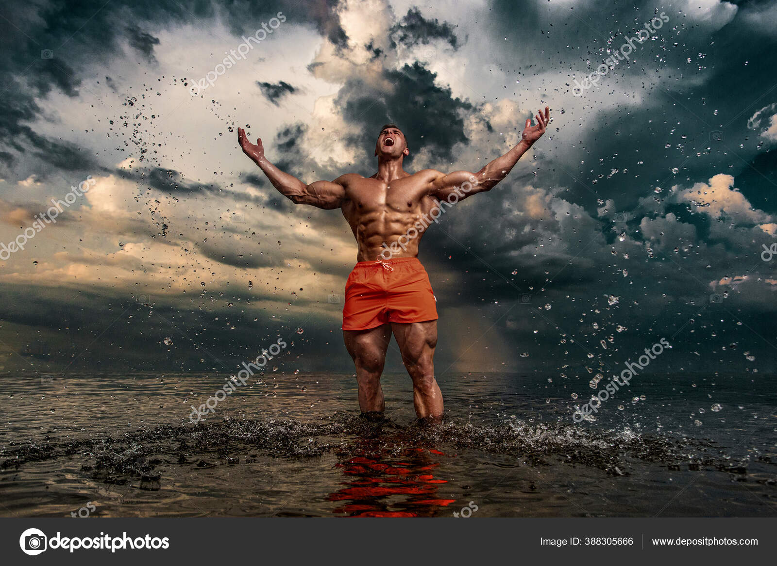 Fit Athlete Bodybuilder On The Beach Attractive Young Man Lifeguard On
