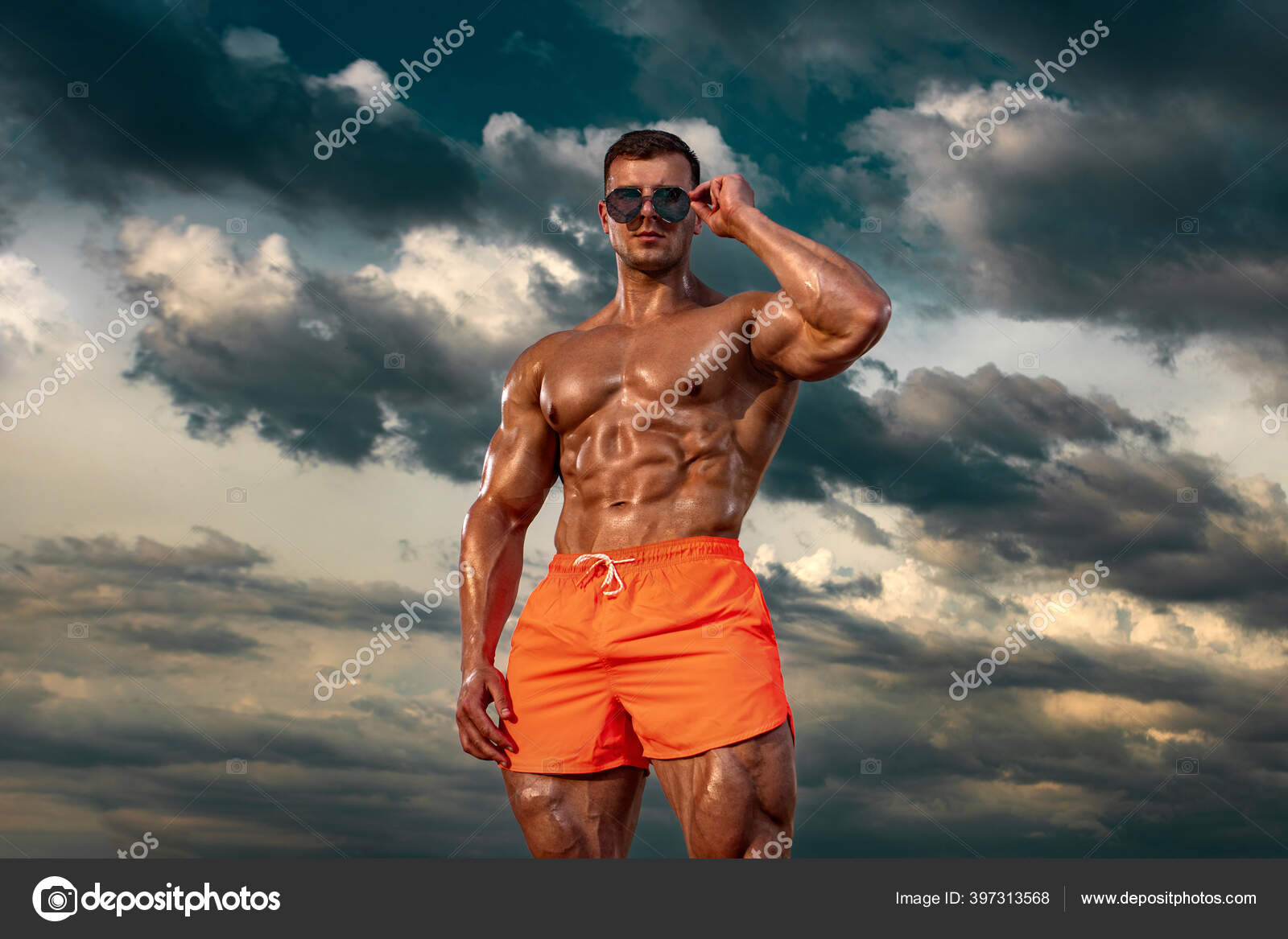 Fit Athlete Bodybuilder On The Beach Attractive Young Man Lifeguard