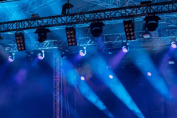 professional lightning equipment. spotlights over concert stage. bright ...
