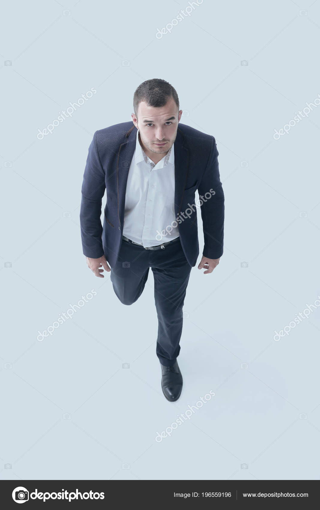 In full growth.top view of successful businessman goes forward. — Stock ...