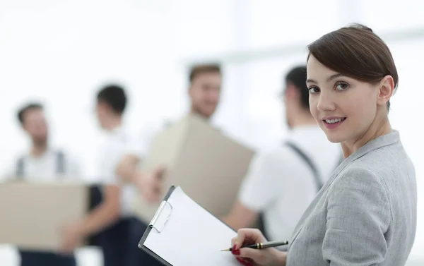 Businessman with documents, creating a stack of cardboard boxes. Stock ...