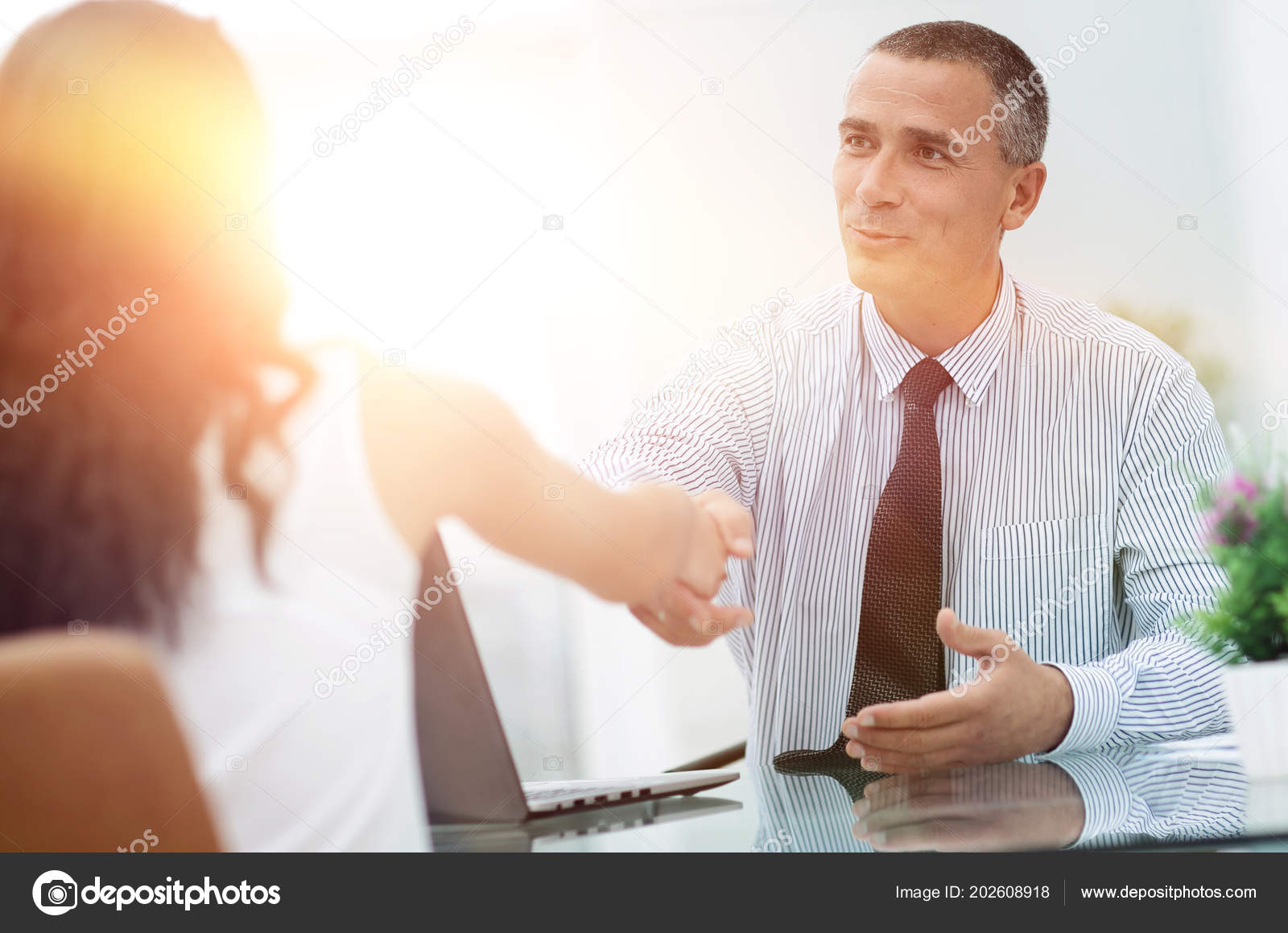 Closeup.handshake Manager and client Stock Photo by ©depositedhar 202608918