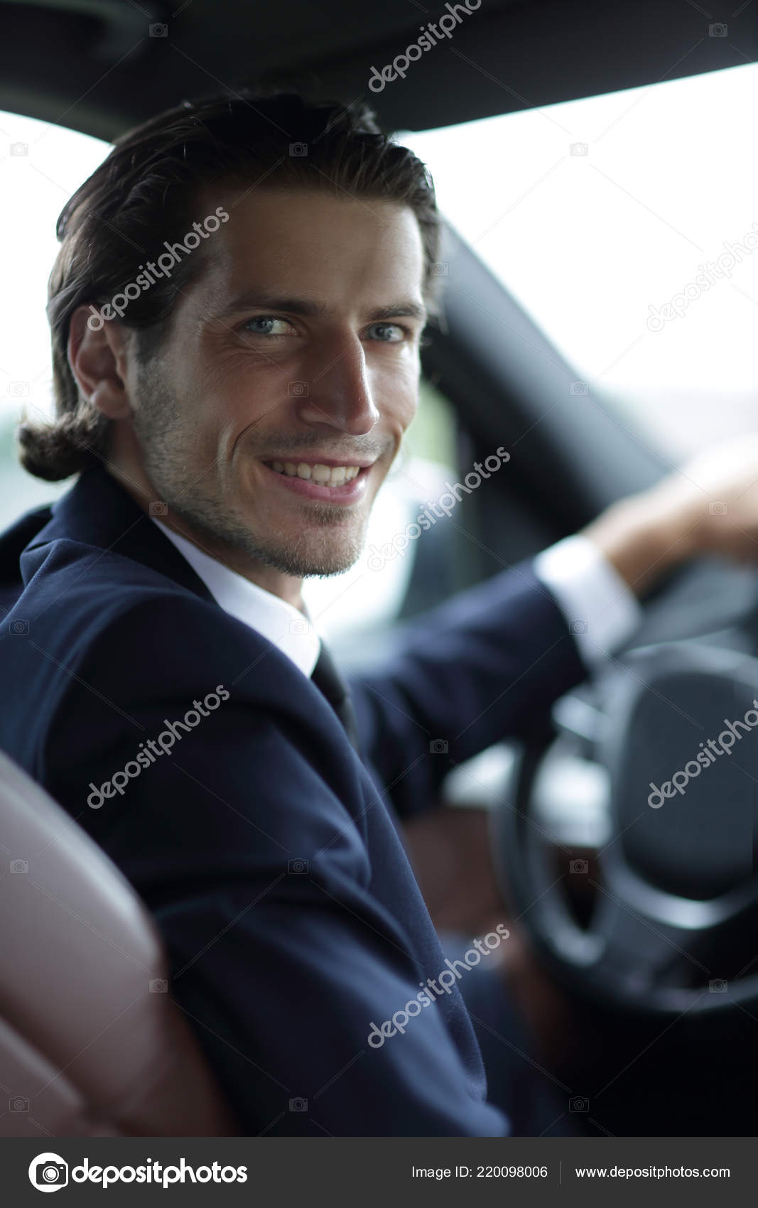 Man sitting behind the wheel of a car — Stock Photo © depositedhar ...