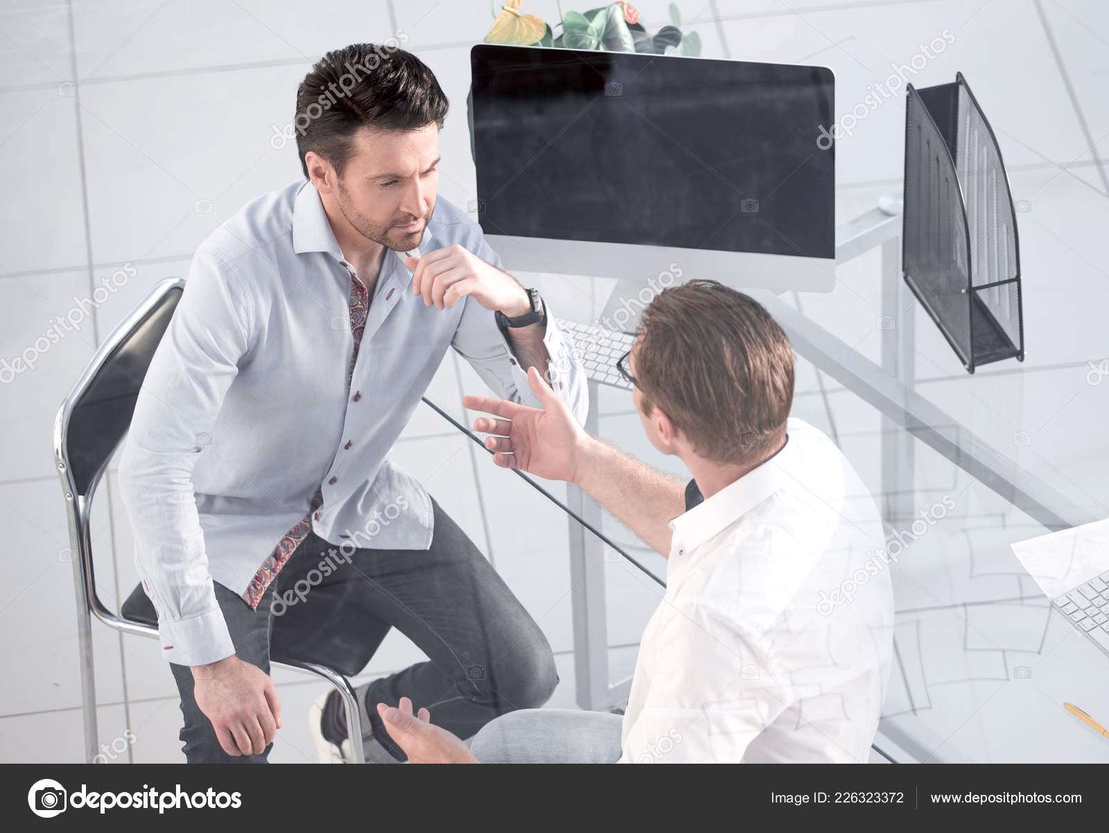 Top view.the Manager and the client are talking Stock Photo by ...
