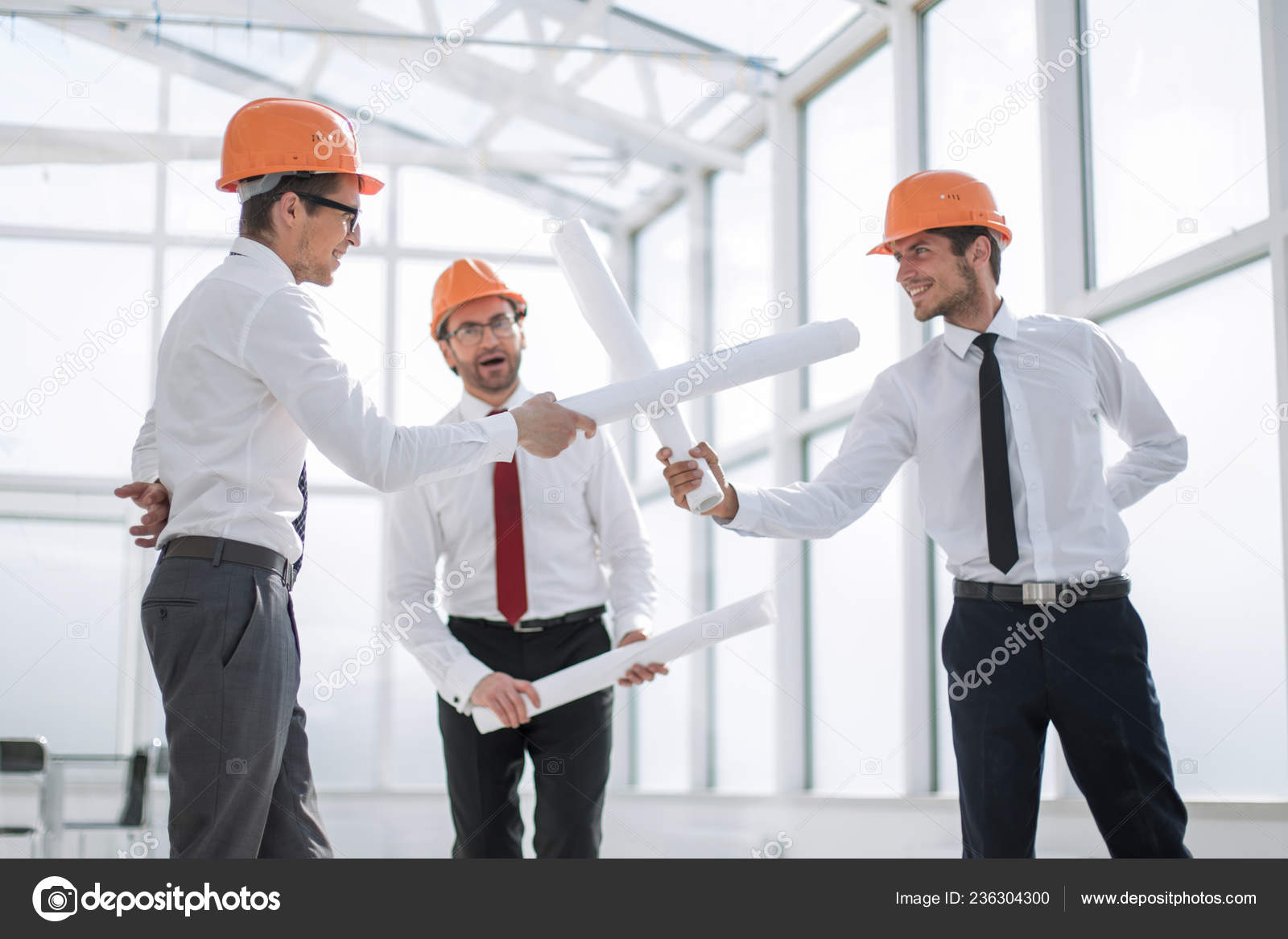 Three architects struggle with curtailed construction plans — Stock ...