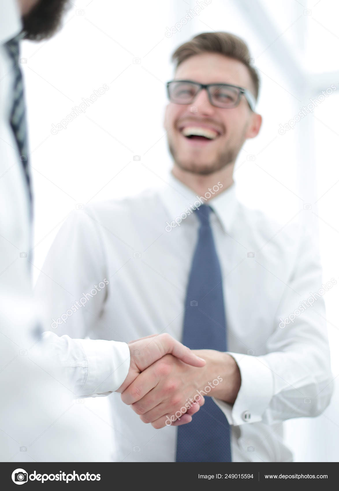 Close up.welcome handshake of the companys employees Stock Photo by ...