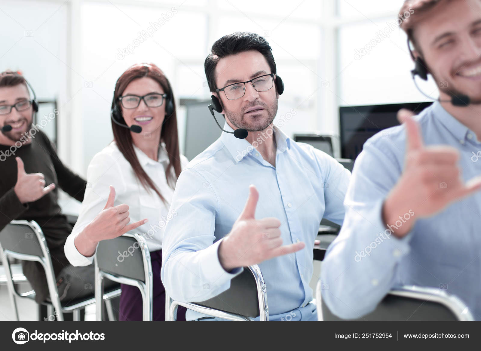 Close up.smiling call center staff showing thumb up — Stock Photo ...