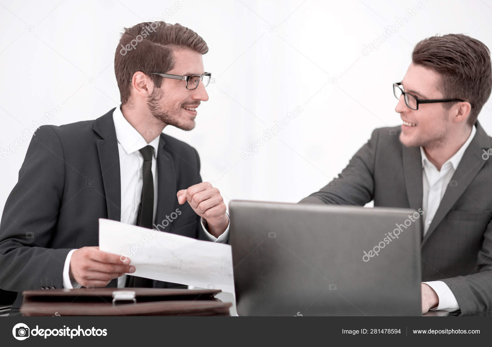 Close up.two business men discussing a business document — Stock Photo ...