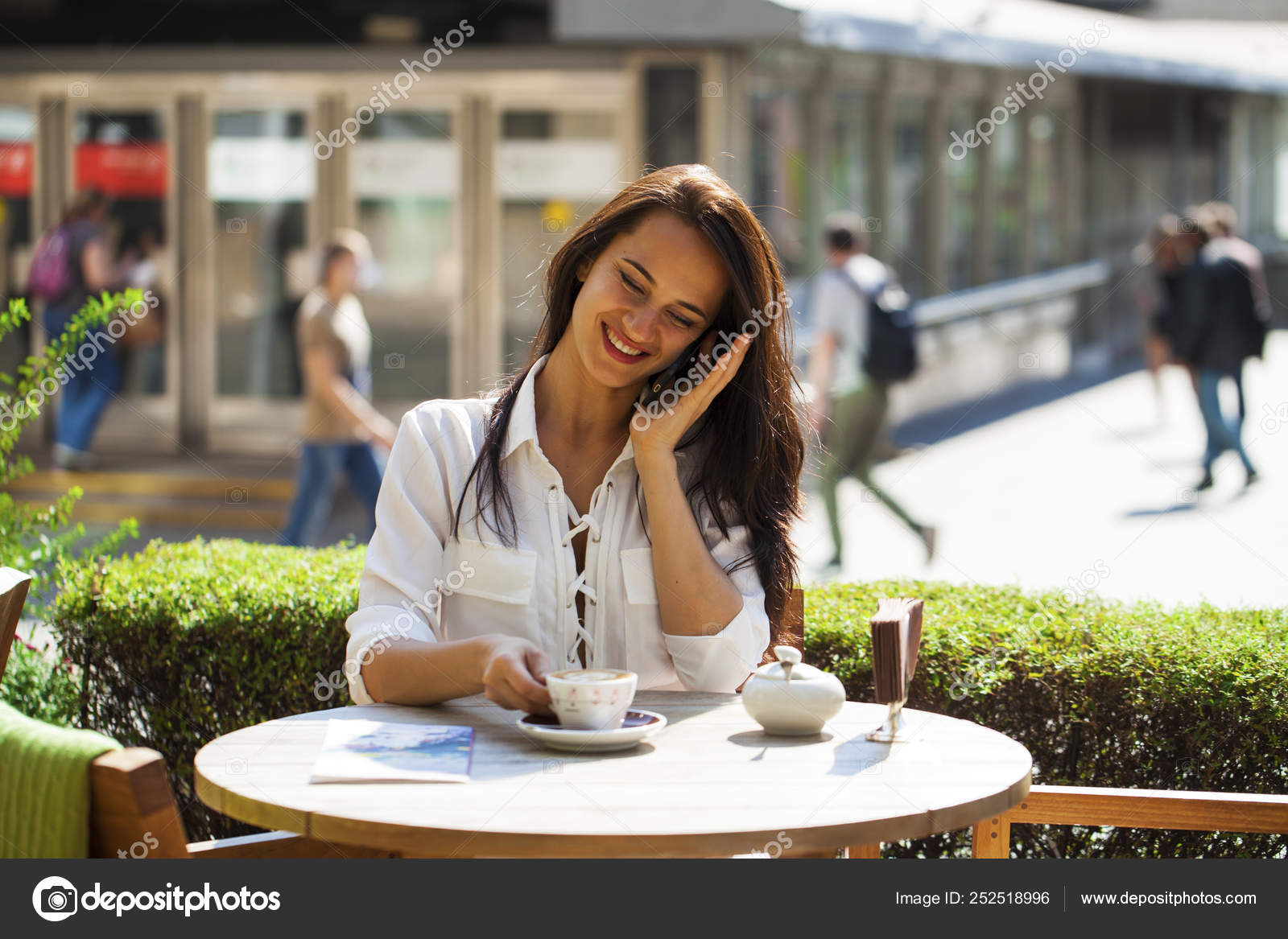 Elegant girl calling someone while resting in outdoor cafe with — Stock ...