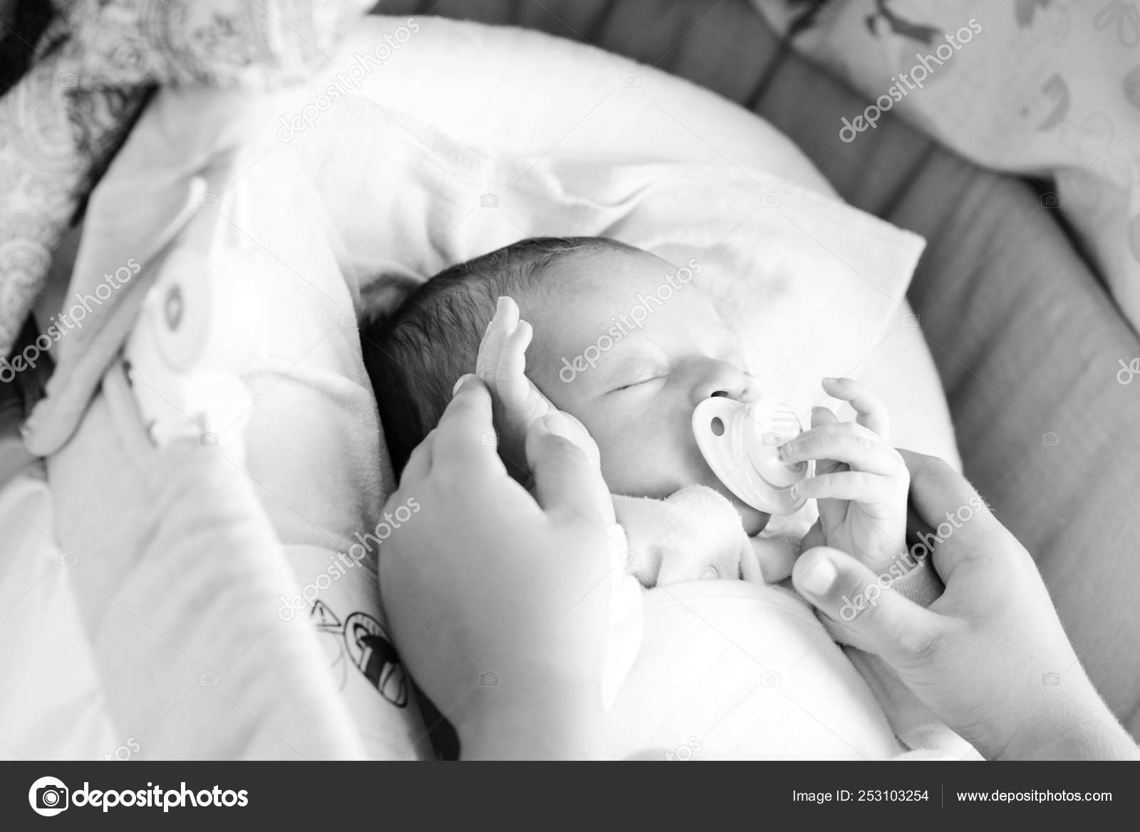 Newborn baby in crib — Stock Photo © Reanas #253103254