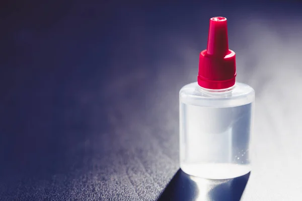 E-cig refill liquid.E-liquid for e-cig vaping device.Transparent ...