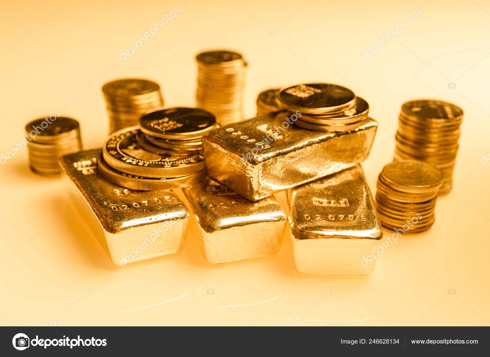 Gold bars and stack of gold coins. Background for finance banking ...