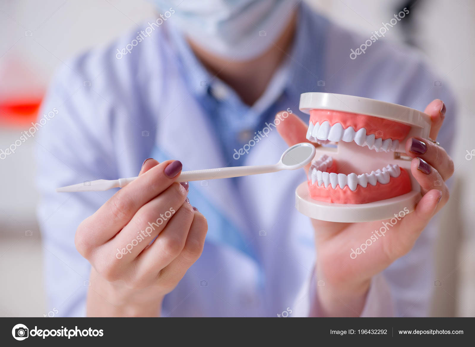 Dentist practicing work on tooth model Stock Photo by ©Elnur_ 196432292
