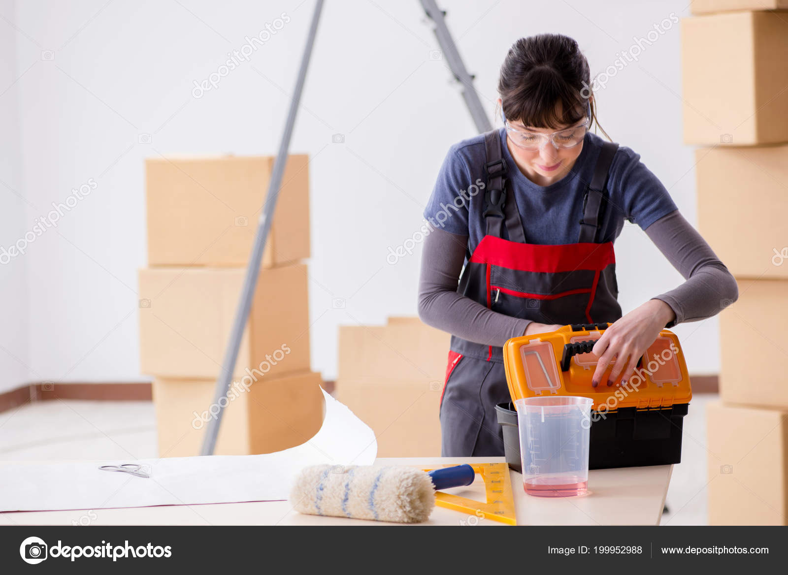 Woman preparing for wallpaper work Stock Photo by ©Elnur_ 199952988