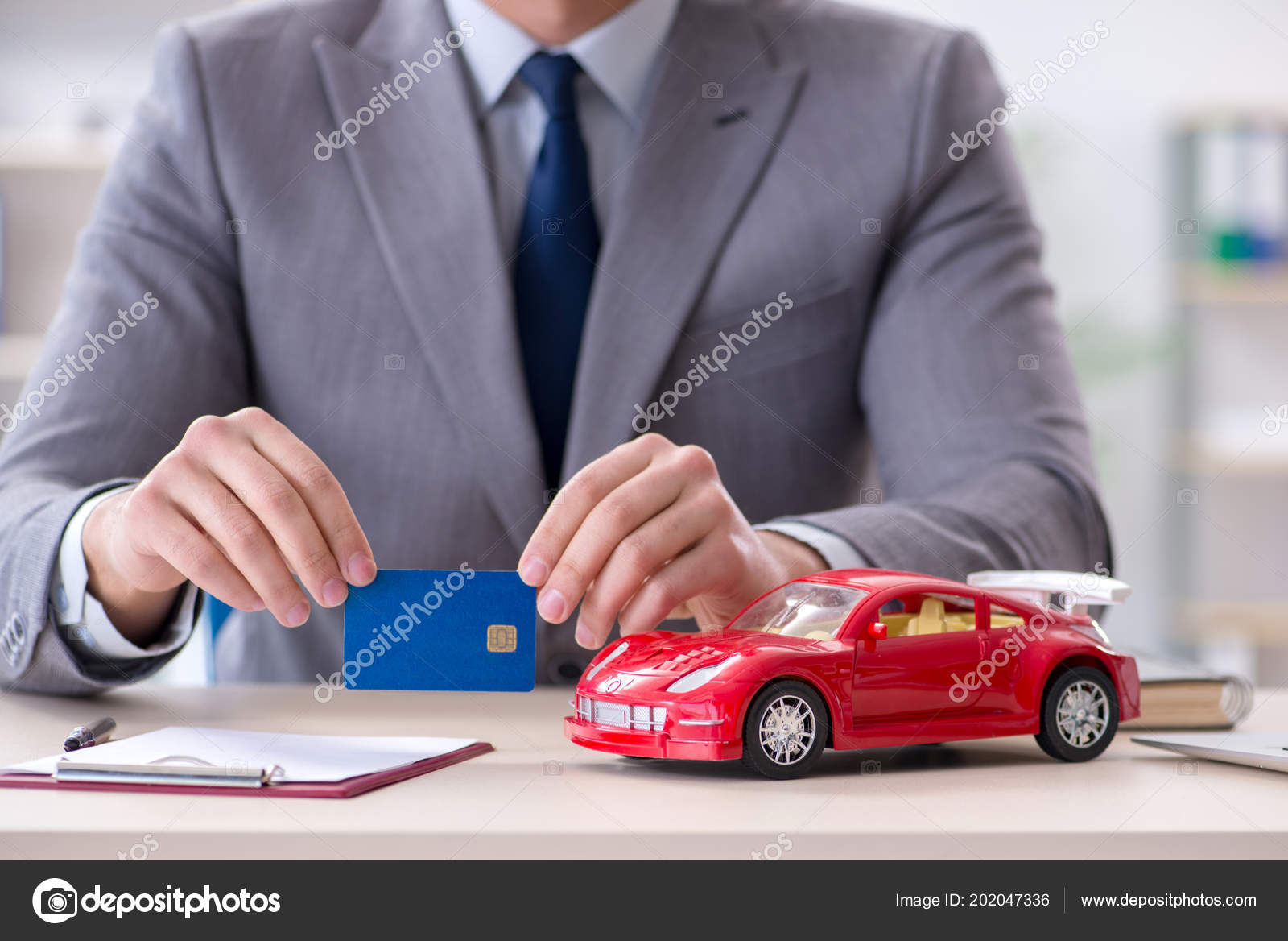 Agent offering car motor insurance — Stock Photo © Elnur_ #202047336