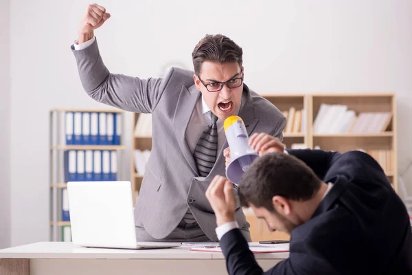Angry boss shouting at his employee Stock Photo by ©Elnur_ 205255104