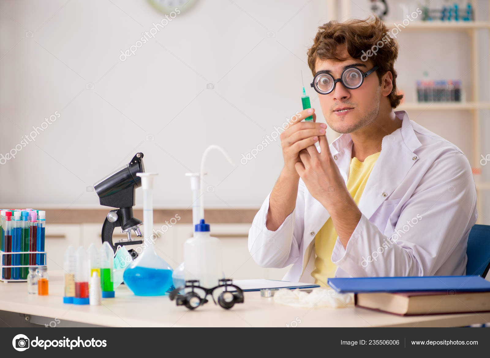 Funny crazy chemist doing experiments and tests Stock Photo by ©Elnur ...