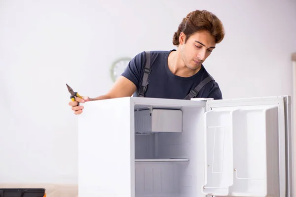 Repairing refrigerator Stock Photos, Royalty Free Repairing ...