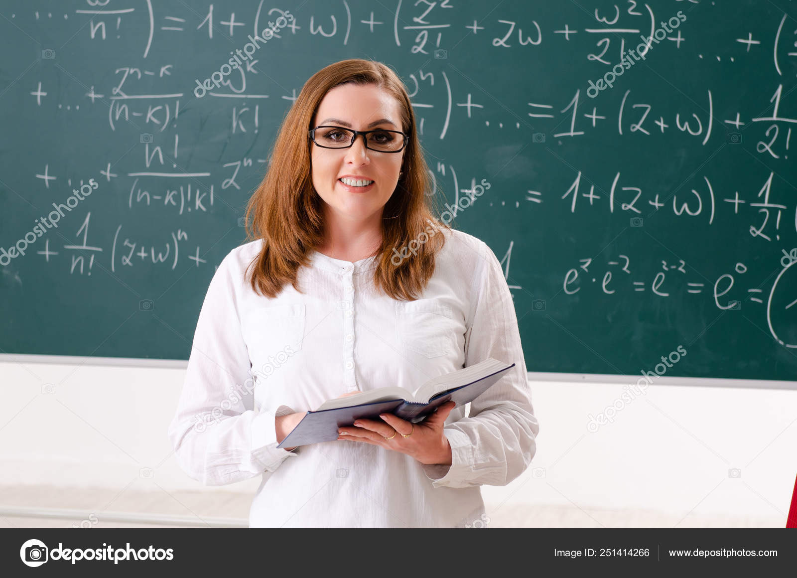 Female math teacher in the classroom — Stock Photo © Elnur_ #251414266