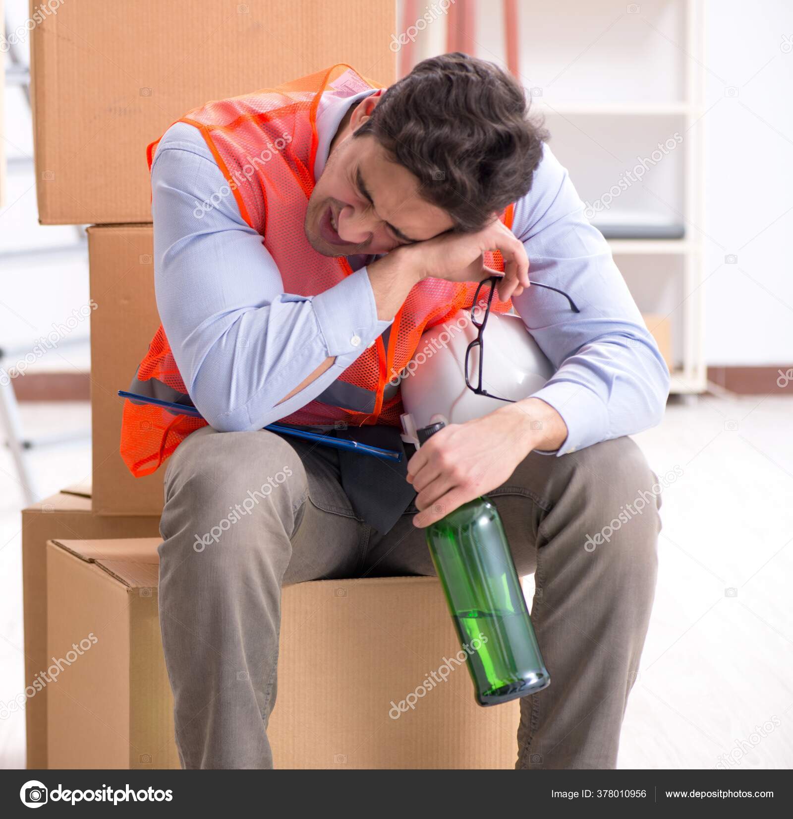 Delivery man drunk at work — Stock Photo © Elnur_ #378010956