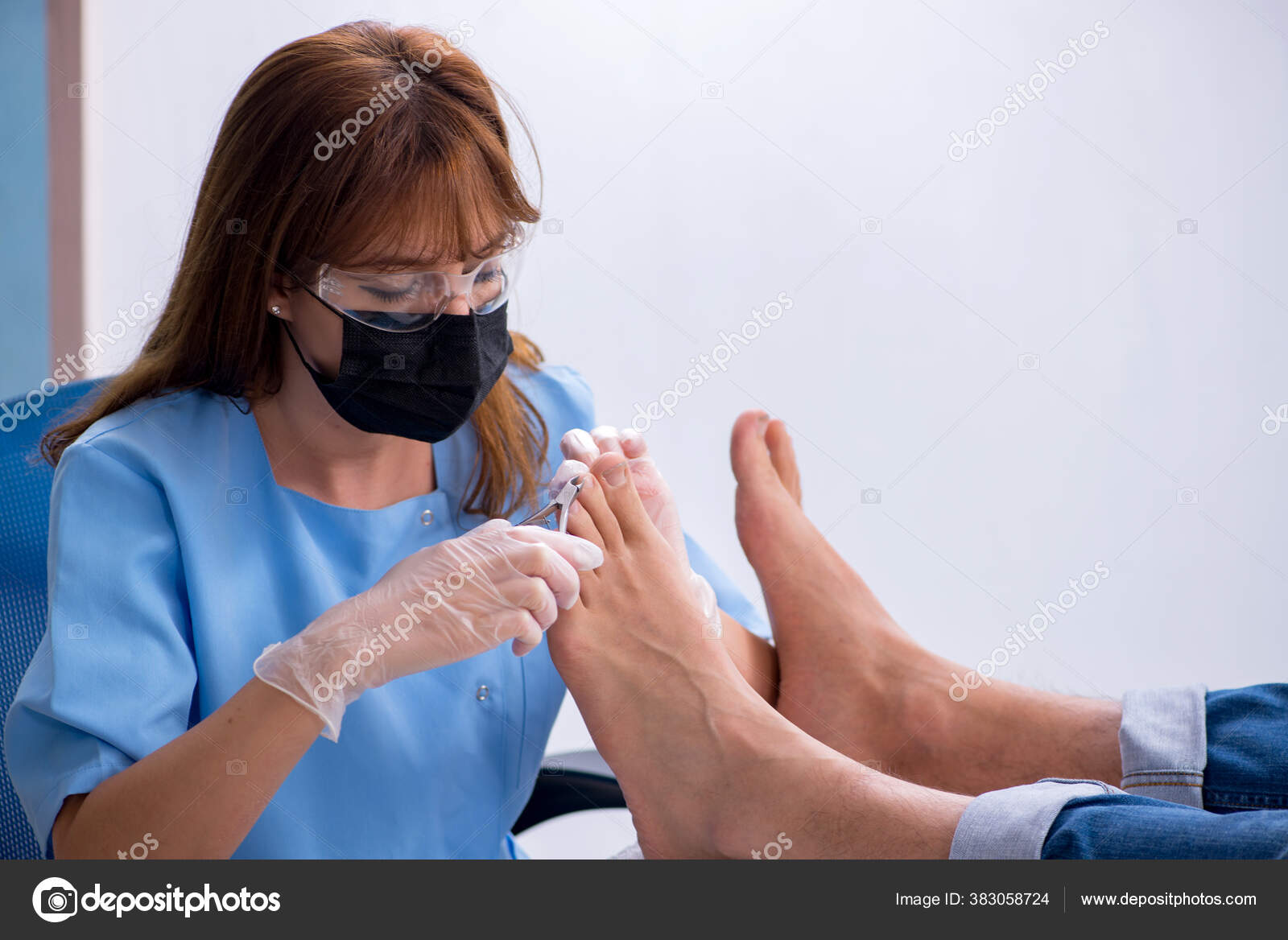 Podiatrist treating feet during procedure ⬇ Stock Photo, Image by ...