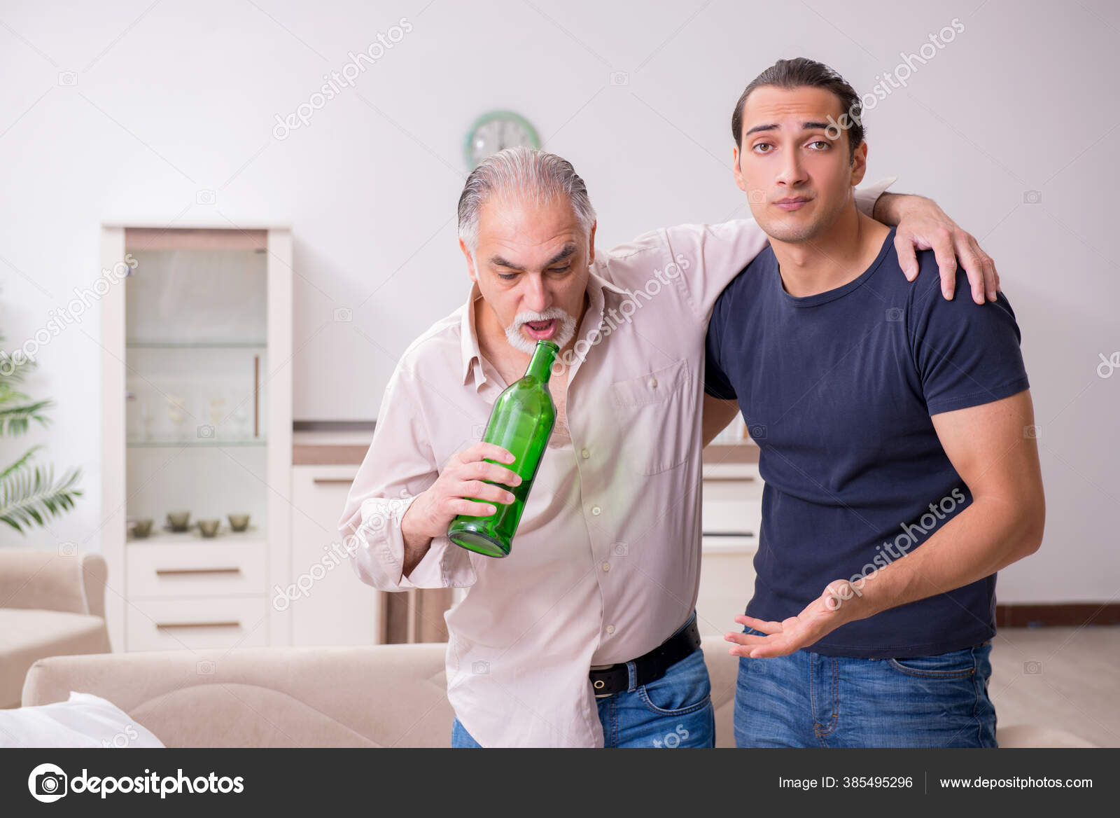 Man with drinking problem and the family — Stock Photo © Elnur_ #385495296