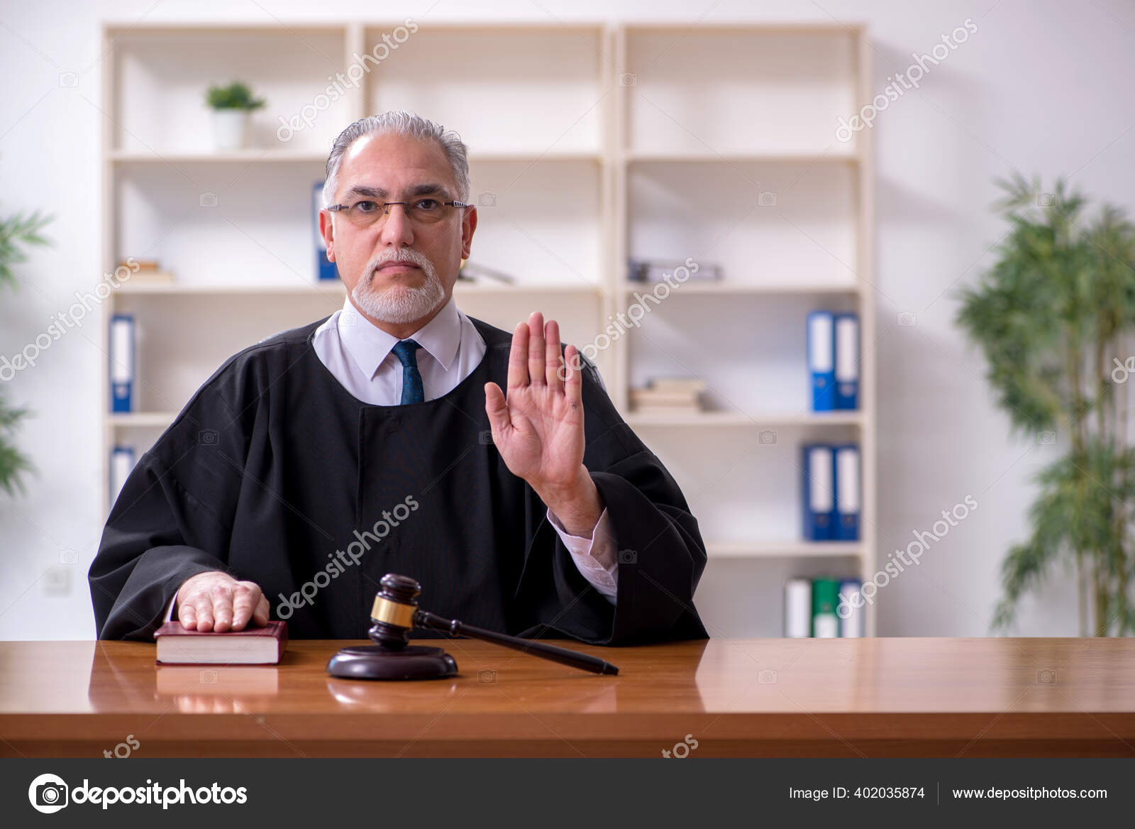 Old male judge working in courthouse Stock Photo by ©Elnur_ 402035874