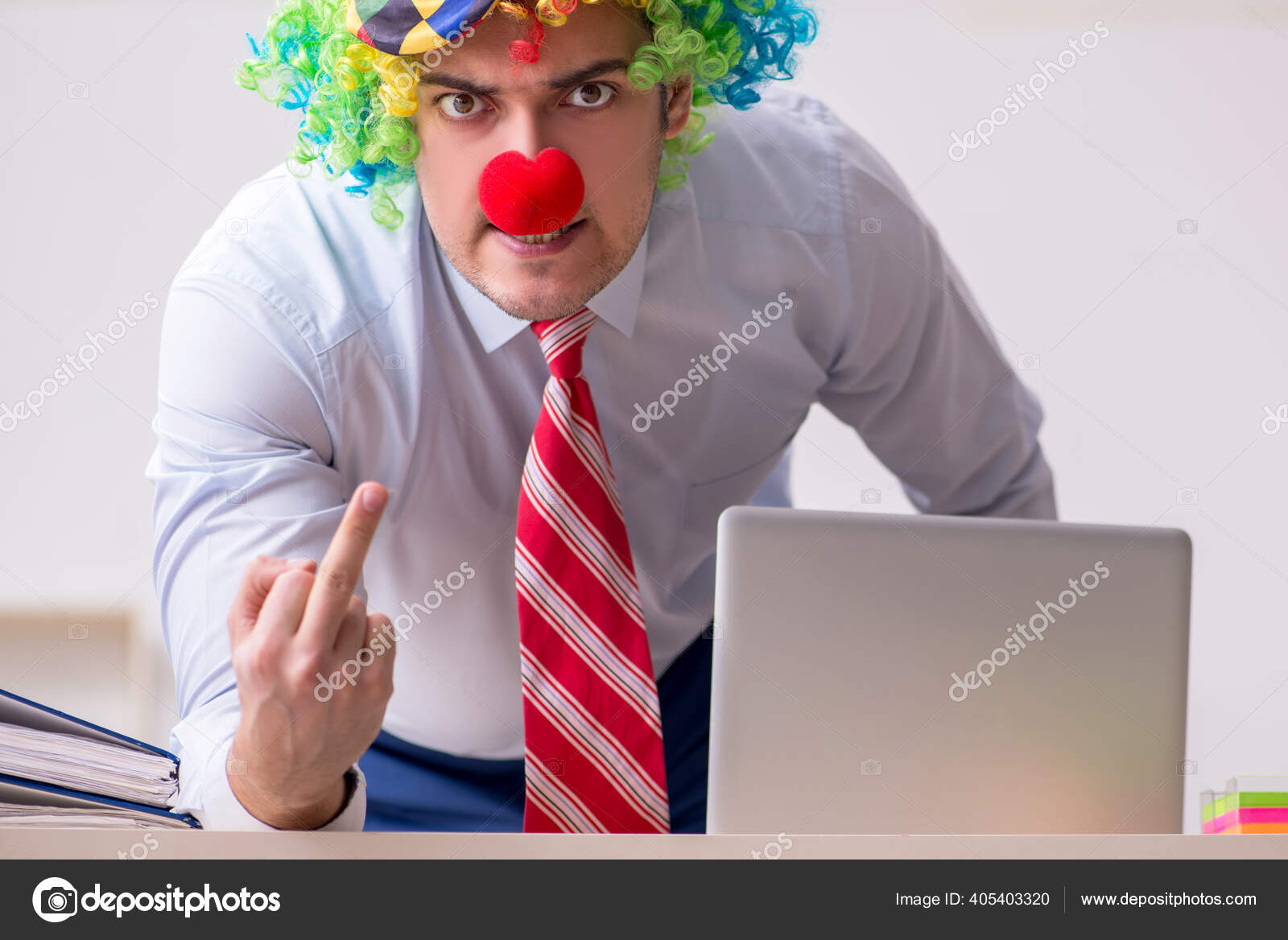 Funny employee clown working in the office — Stock Photo © Elnur ...