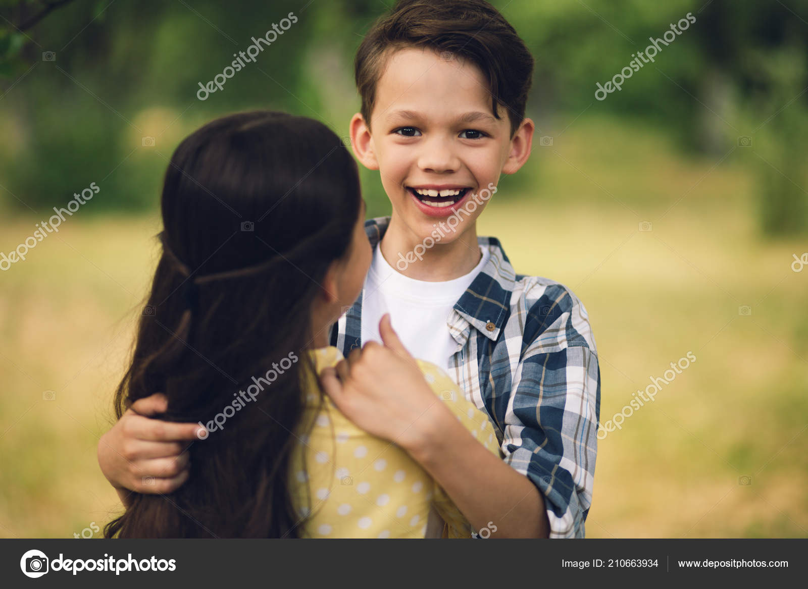 Little kids hugging. Stock Photo by ©svyatoslavlipik 210663934