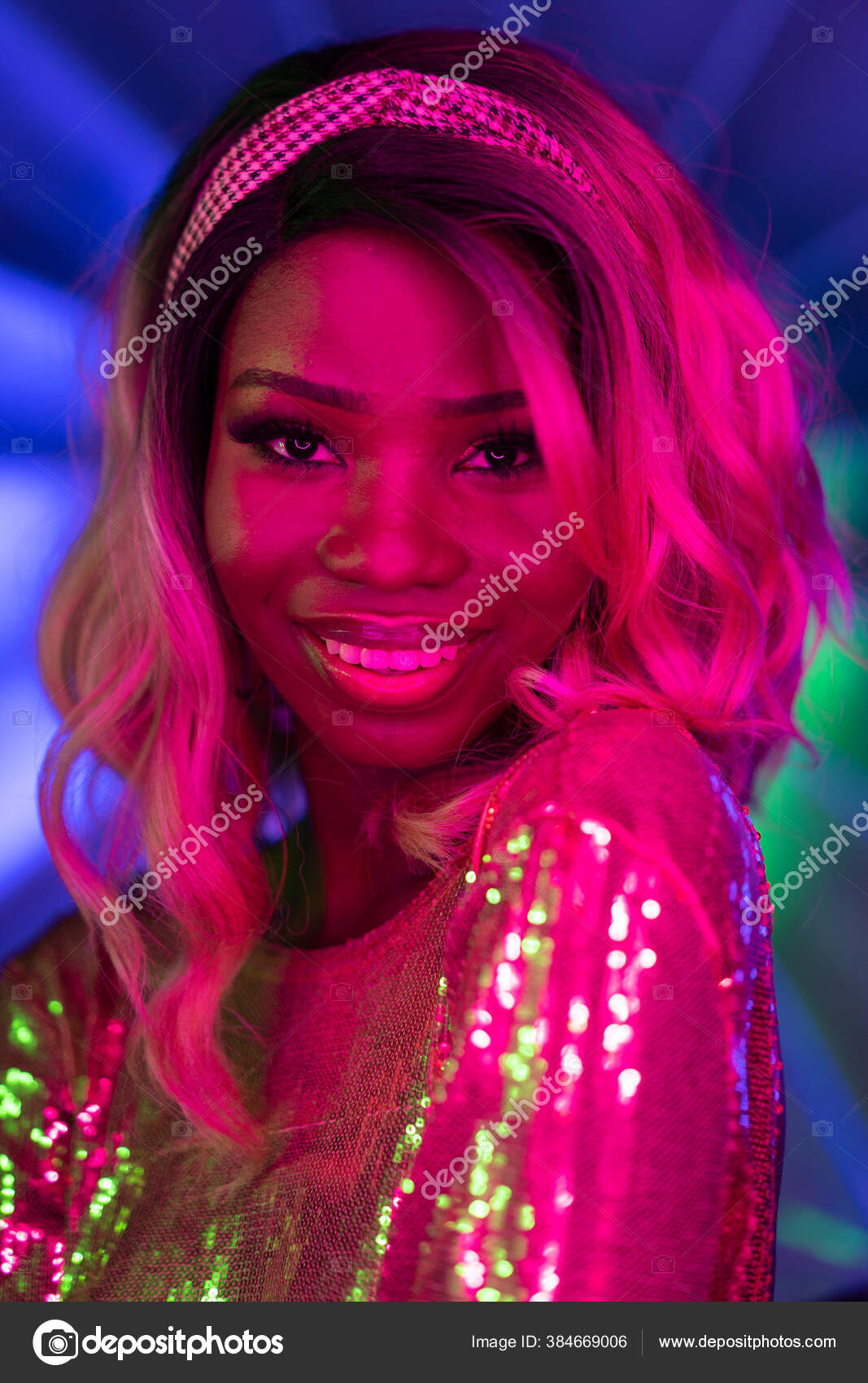 Sexy African Woman Smiles In Pink Neon Glow Close Up Portrait Bright