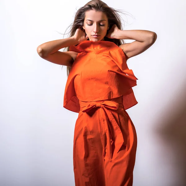 Young Model Woman Orange Dress Pose Studio Stock Photo by ©innervision ...