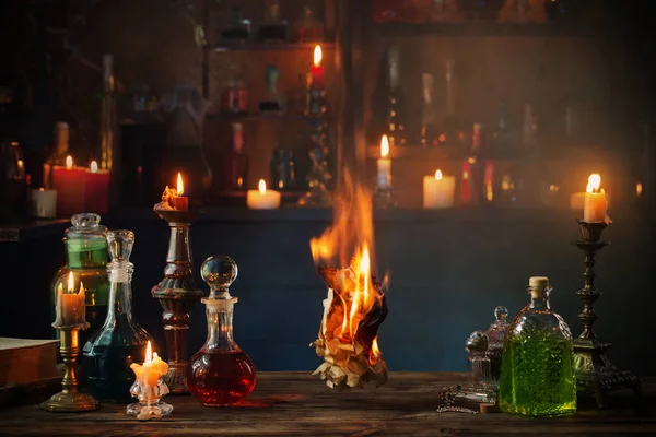 Old burning paper with potions on old wooden table Stock Photo by ...
