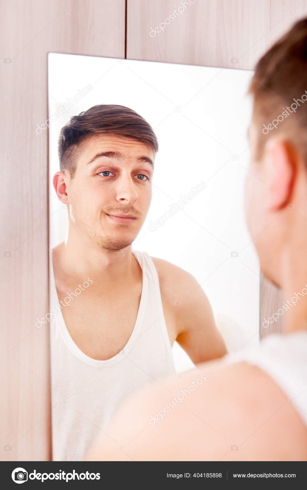 Man Reflection In Mirror