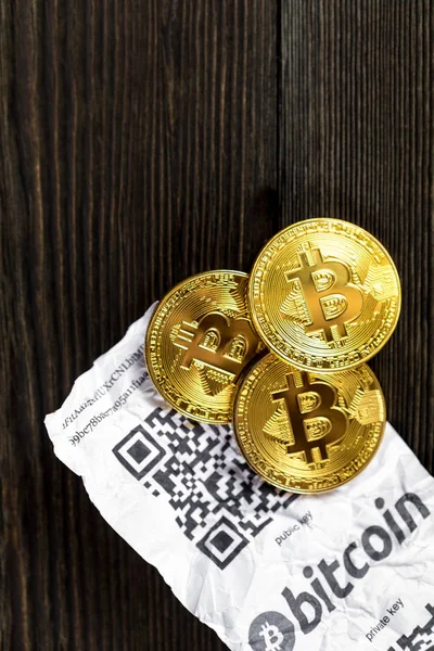 Bitcoin golden coins and paper receipt — Stock Editorial Photo ...