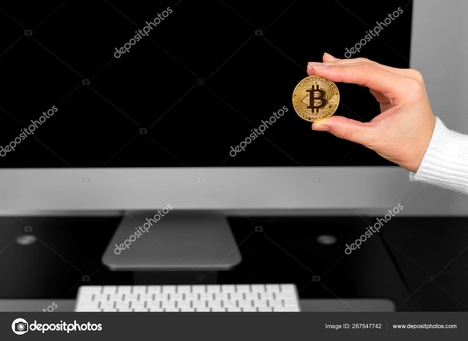 Girl holds a crypt in his hand on a laptop background – Stock Editorial ...