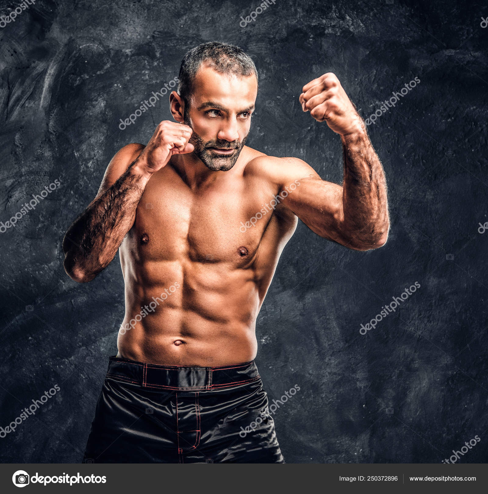 Professional fighter showing kick fighting technique. ⬇ Stock Photo ...