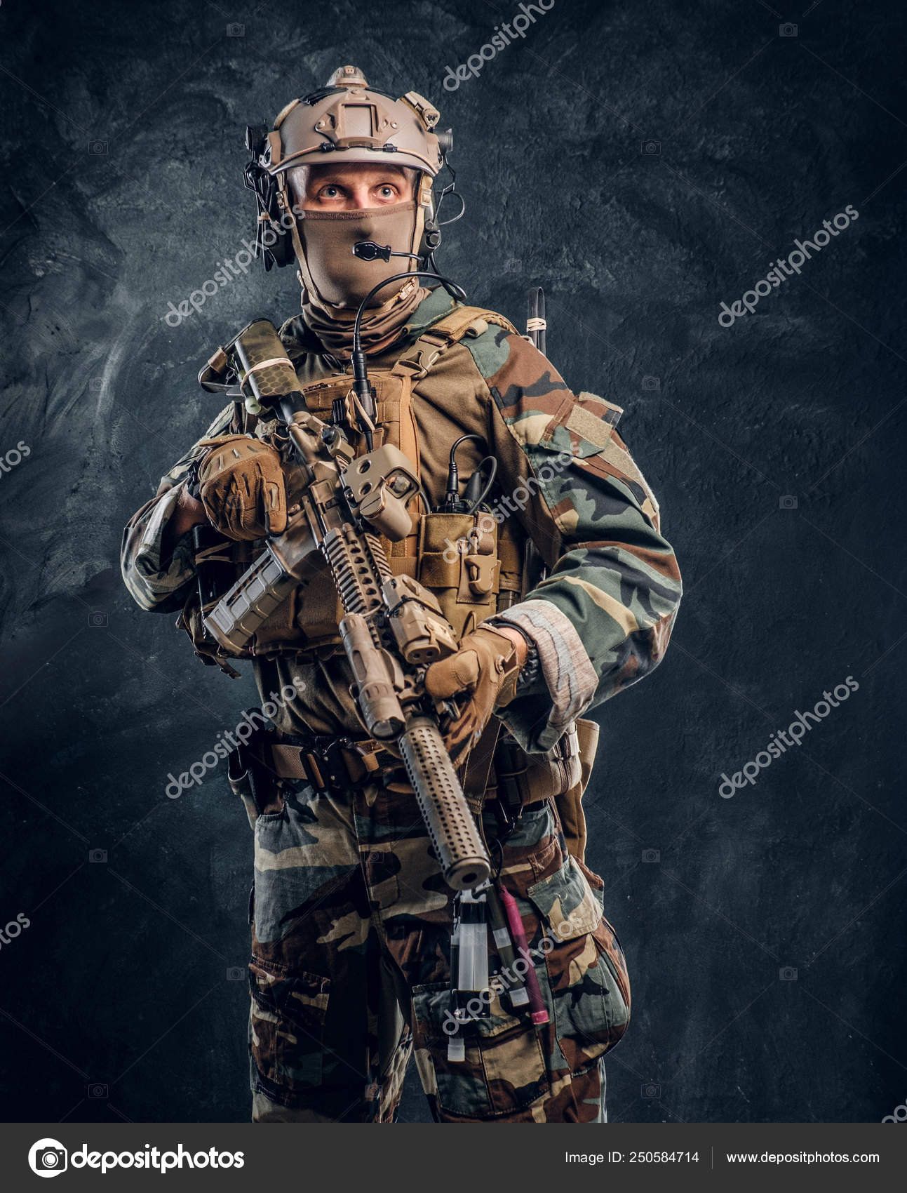 Elite unit, special forces soldier in camouflage uniform posing with ...